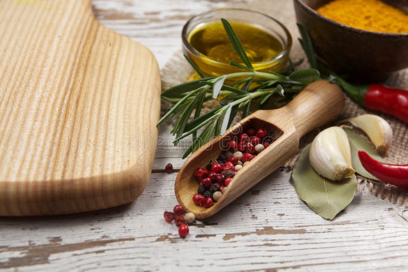 Spices with cutting board stock photo. Image of garlic - 52645600