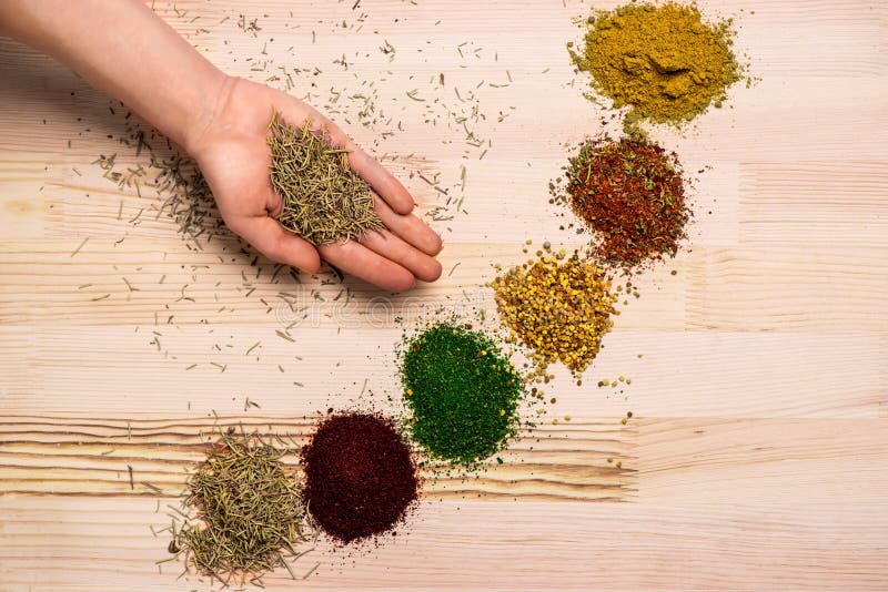 Spices in Hands and on Wooden Table Stock Image - Image of flavor ...