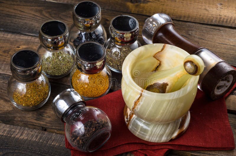 Spices in Jar with Mortar on Wodeen Background Stock Image - Image of ...
