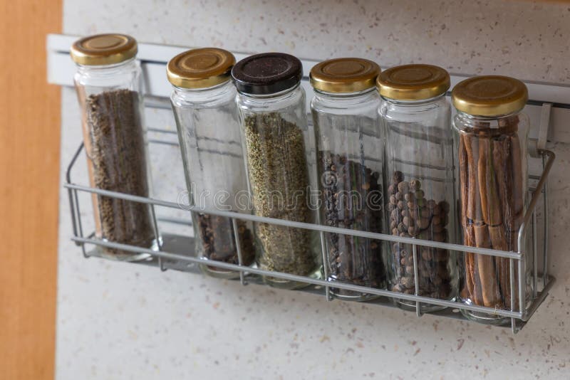 Spices in Jars Stored on a Shelf in the Kitchen Stock Image - Image of ...