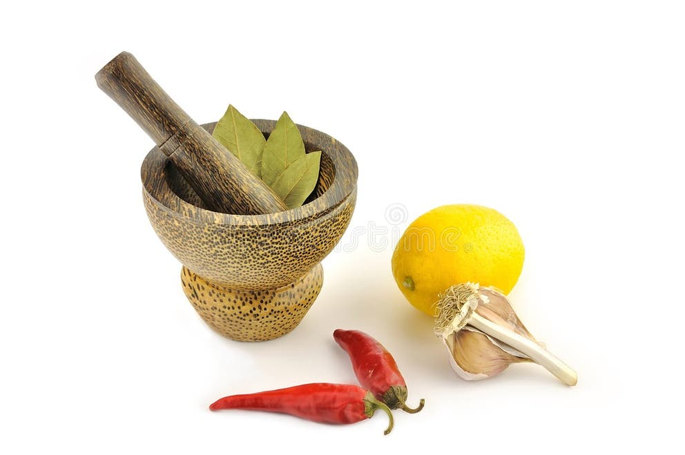 Spices, Lemon and a Mortar on a White Background Stock Photo - Image of ...