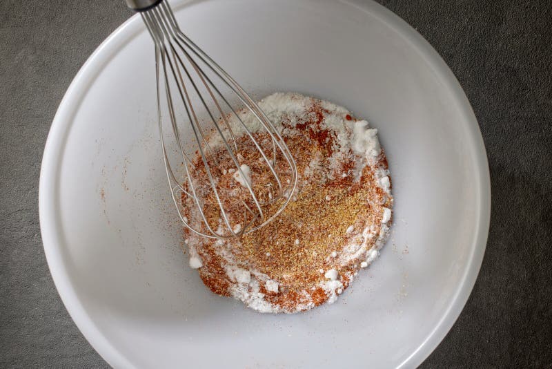 Spices with Salt and Baking Powder are Mixed in a White Bowl Stock ...
