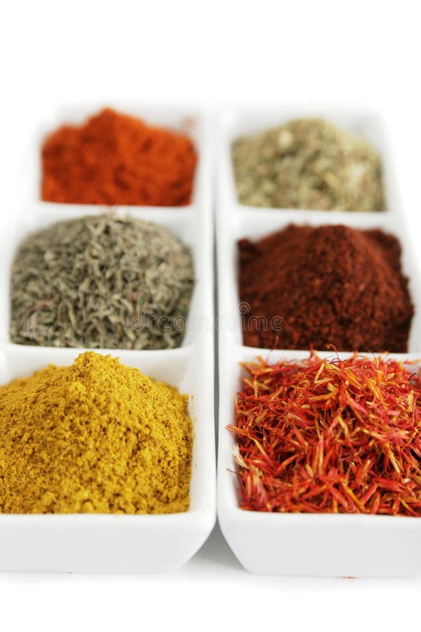 Spices in white container stock image. Image of closeup - 12527399