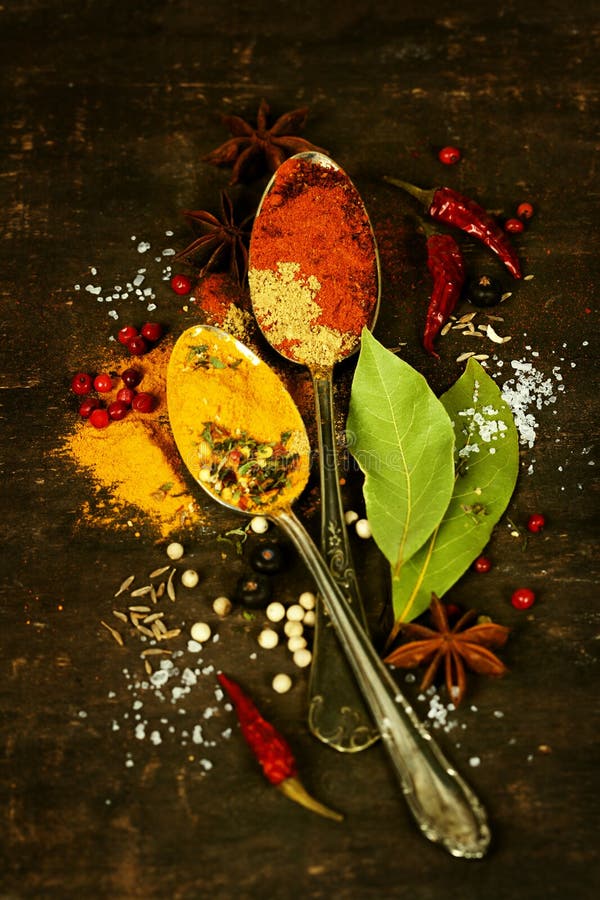 Spices on a wooden board stock photo. Image of pile, gourmet - 28583958
