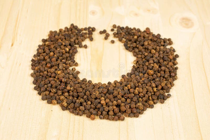 Spicy Black Pepper on Plain Wood Stock Photo - Image of food, isolated ...