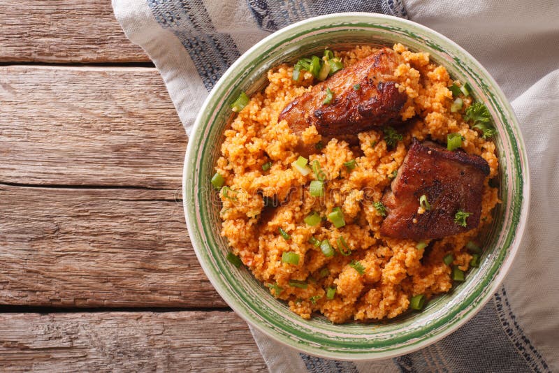 Spicy Bulgur with Beef Close-up on a Plate on the Table. Horizon Stock ...