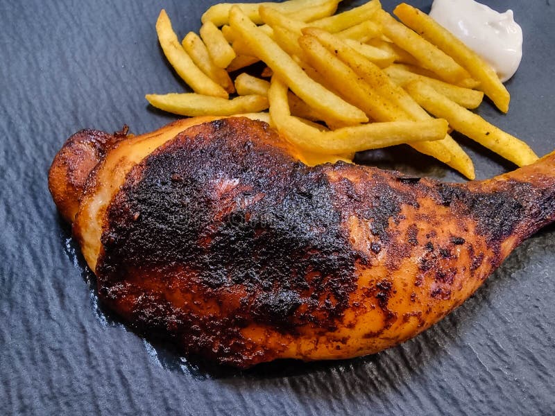 Spicy chicken drumsticks stock image. Image of fire - 258726993