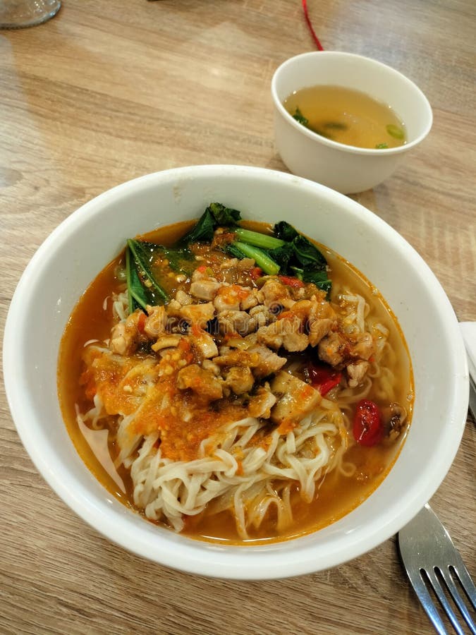 Spicy chicken noodles stock image. Image of yummy, noodles - 299454193