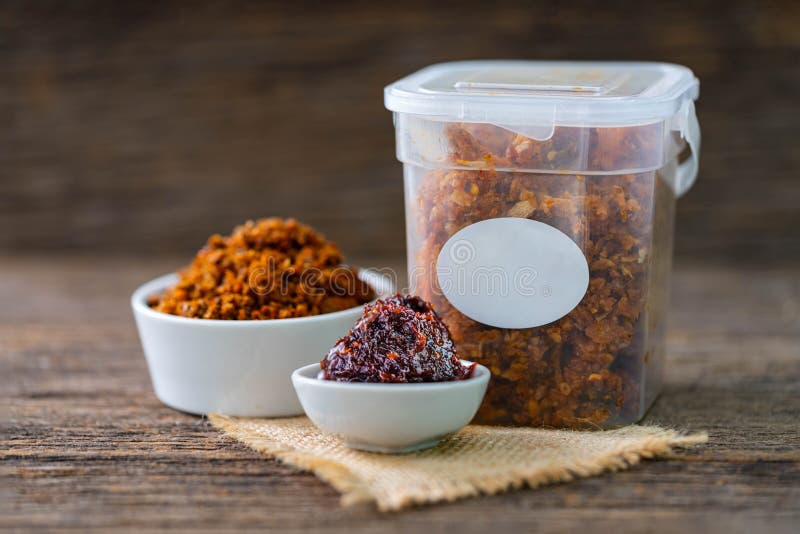 Spicy Chili Paste in White Ceramic and Plastic Containers on Wood ...