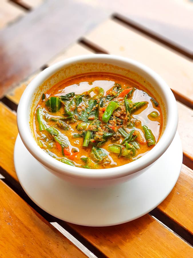 Spicy Curry Bitter Shell in White Plate Stock Photo - Image of roasted ...