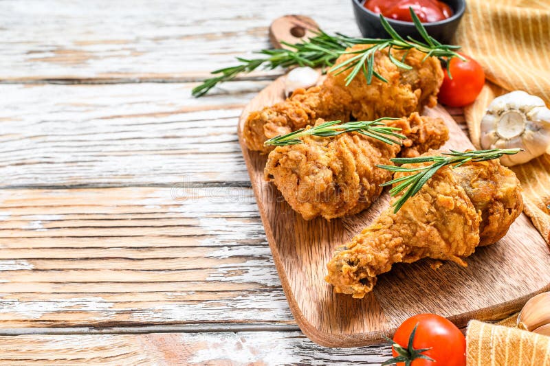 Spicy Deep Fried Breaded Chicken Drumsticks. White Background. Top View ... Spicy Deep Fried Breaded Chicken Drumsticks. White Background. Top View ...