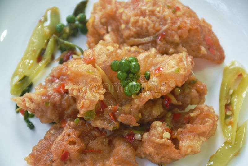 Spicy Deep Fried Slice Bass Fish with Chili on Plate Stock Image ...
