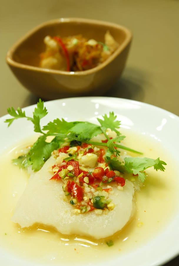 Spicy Dolly Fish with Chicken Stock Photo - Image of green, sauce ...