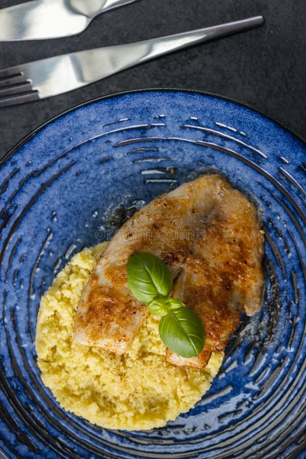 Spicy Fillet of White Cod with Couscous Stock Photo - Image of cooked ...