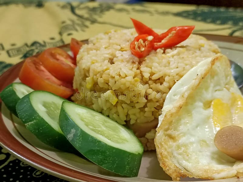 Spicy Fried Rice with Egg and Cucumber Editorial Photo - Image of ...