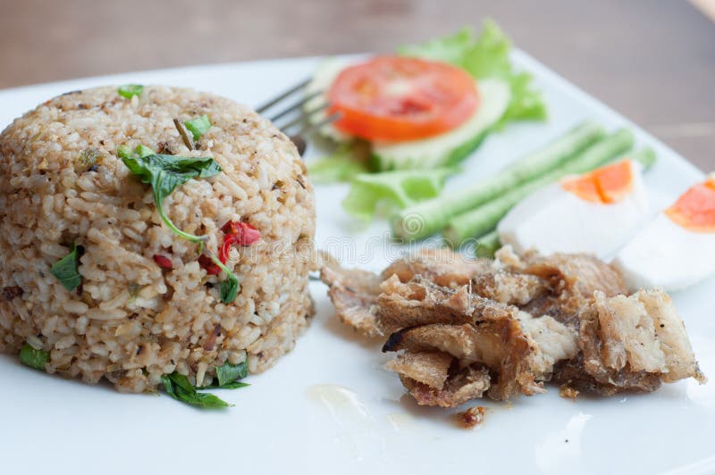 Spicy Fried Rice With Fried Fish With Salted Egg Stock Photo - Image of ...