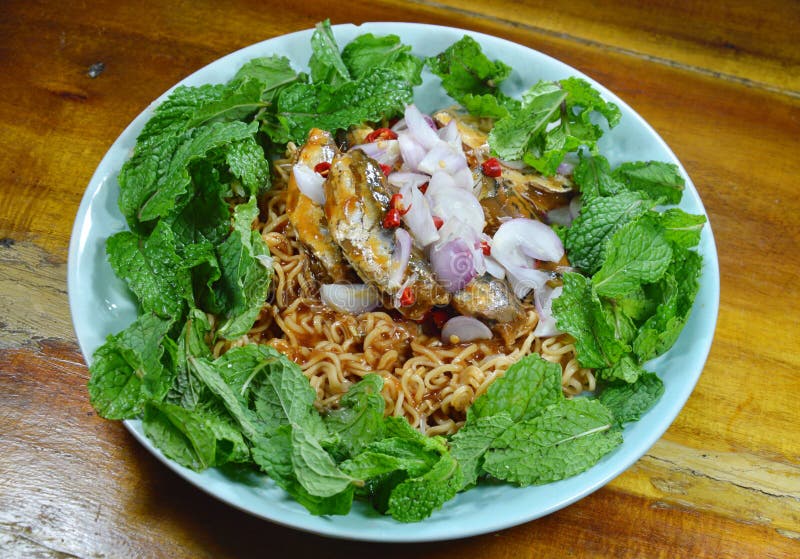 Spicy Instant Noodle with Fish Canned Salad in Plate Stock Photo ...