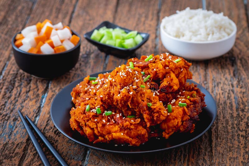 Spicy Korean Fried Chicken with Pickled Radish and Rice Stock Image ...