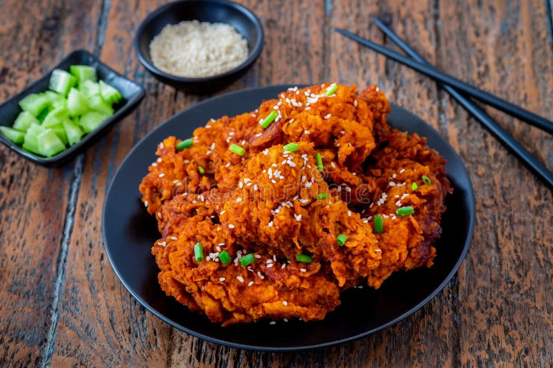 Spicy Korean Fried Chicken with Pickled Radish and Rice Stock Image ...