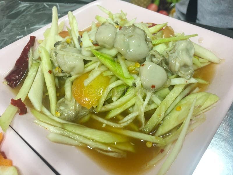 Spicy Mango Salad with Oyster, Thai Food Stock Image - Image of ...
