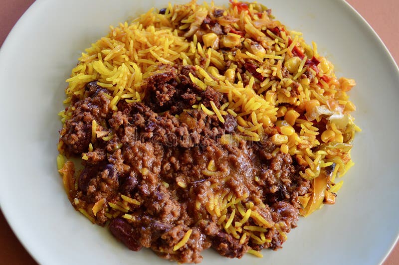 Mexican Beef with Yellow Rice and Beans Stock Image - Image of yellow ...