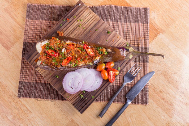 Spicy Minced Pork Salad with Flaming Eggplant. Stock Image - Image of ...