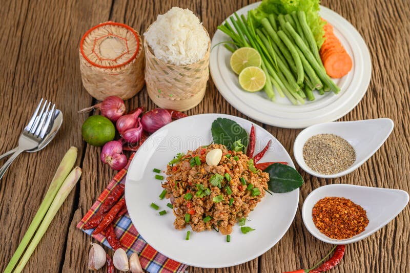 Spicy Minced Pork on a White Plate and Sticky Rice Box Stock Photo ...