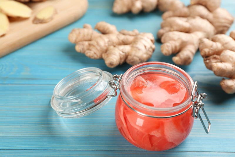 Spicy Pickled Ginger and Root on Light Blue Wooden Table Stock Image ...