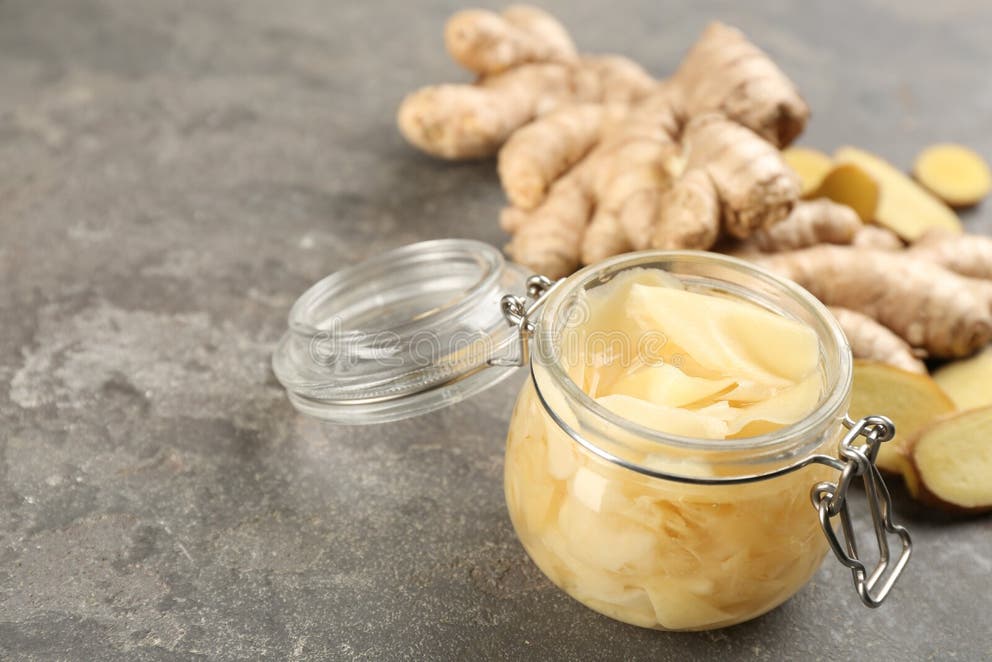 Spicy Pickled Ginger and Root on Light Grey Table, Closeup. Space for Text Stock Photo - Image ...