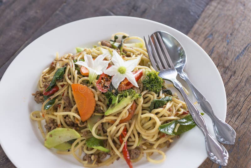 Spicy pork spaghetti stock image. Image of fork, drinks - 56709333