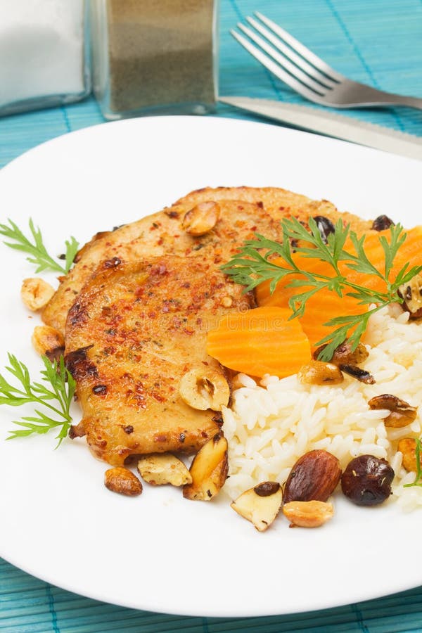Spicy Pork Steak with Nuts and Rice Stock Image - Image of roasted ...