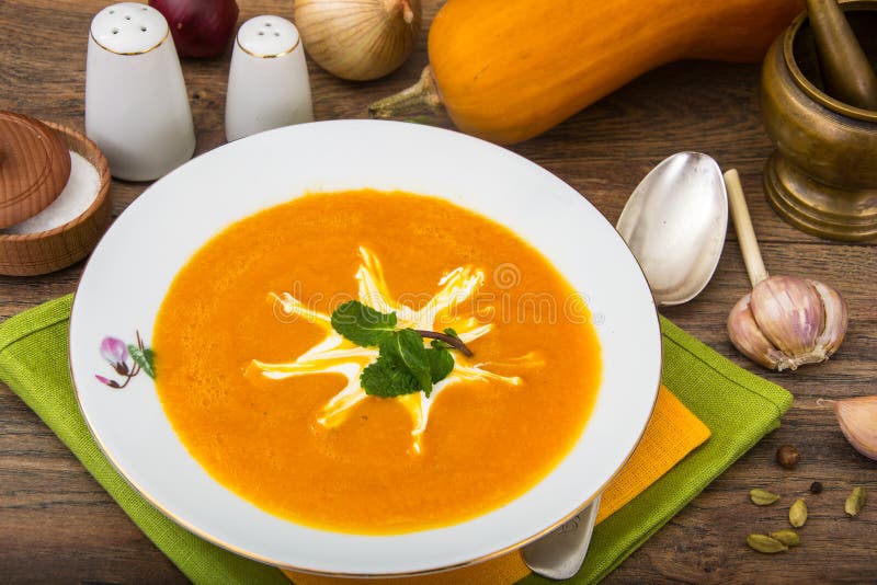Spicy pumpkin puree soup stock photo. Image of simple - 90556436