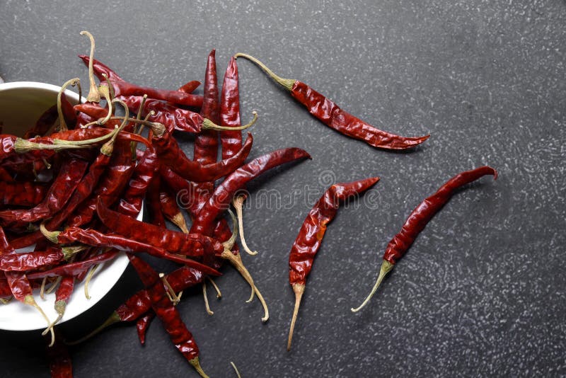 Spicy Red Chilli Powder with Super Chilli Background Stock Photo ...