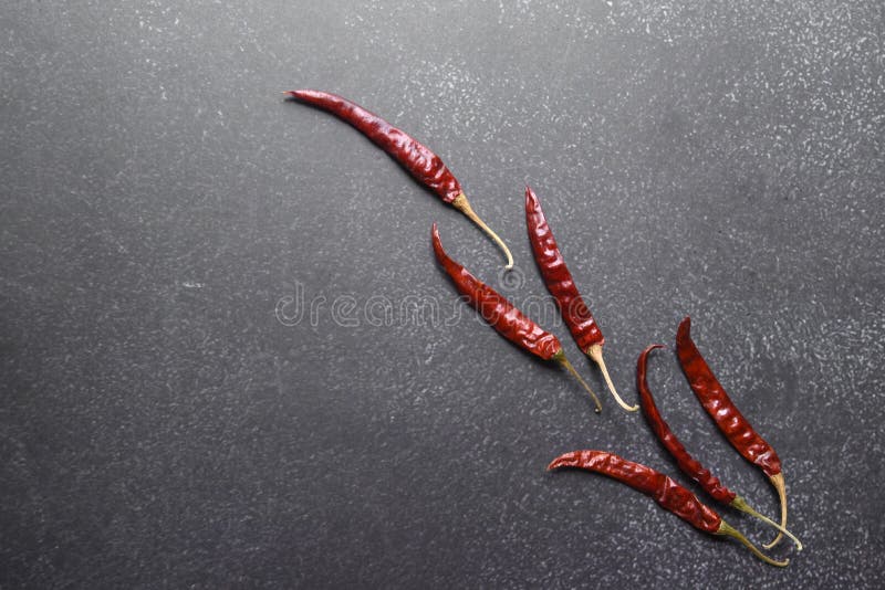 Spicy Red Chilli Powder with Super Chilli Background Stock Photo ...