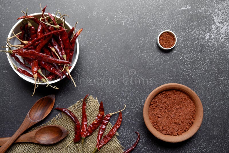 Spicy Red Chilli Powder with Super Chilli Background Stock Photo ...