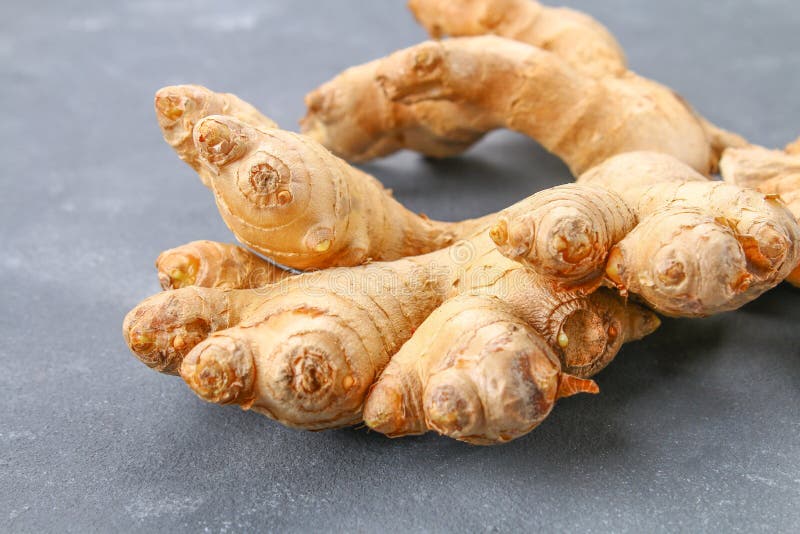Spicy Root of Ginger on a Wooden Table. Stock Photo - Image of healthy ...