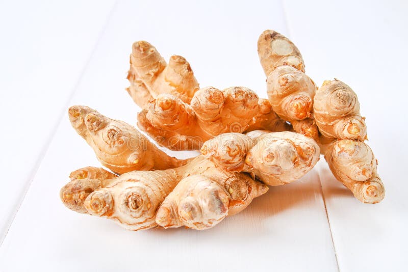 Spicy Root of Ginger on a Wooden Table. Stock Photo - Image of cuisine ...