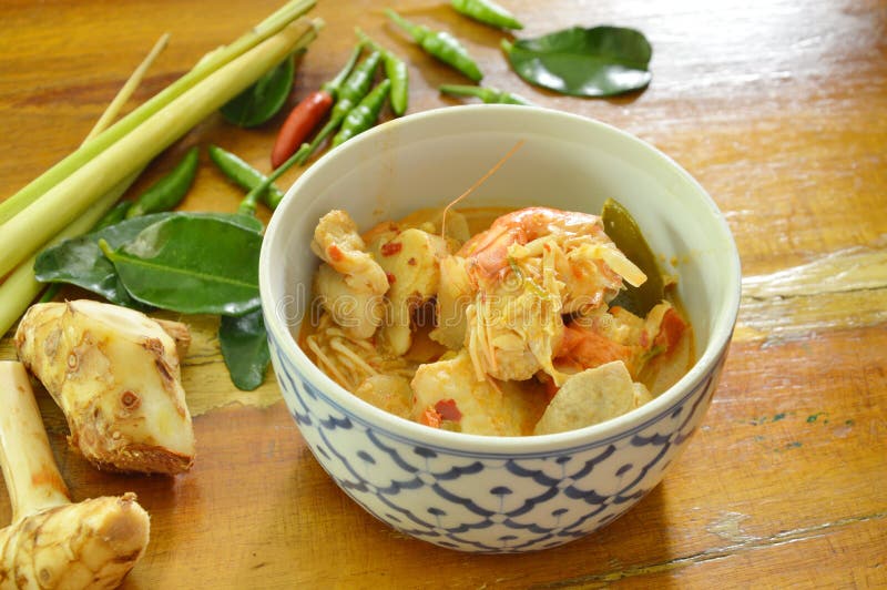 Spicy Shrimp and Fish Tom Yum Soup in Bowl Stock Photo - Image of spice ...