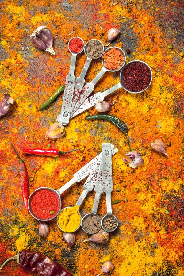 Spicy Spices in Bowls with Measuring Spoons. Stock Image - Image of ...