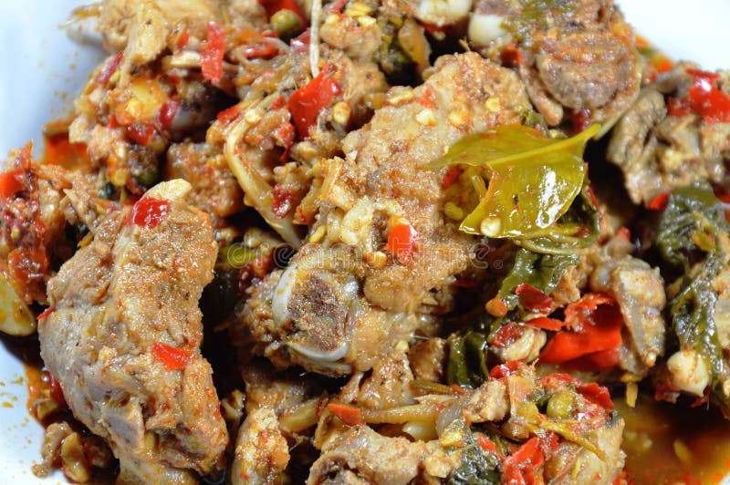 Spicy Stir-fried Pork Rib and Chicken with Lemon Leaf Stock Photo ...