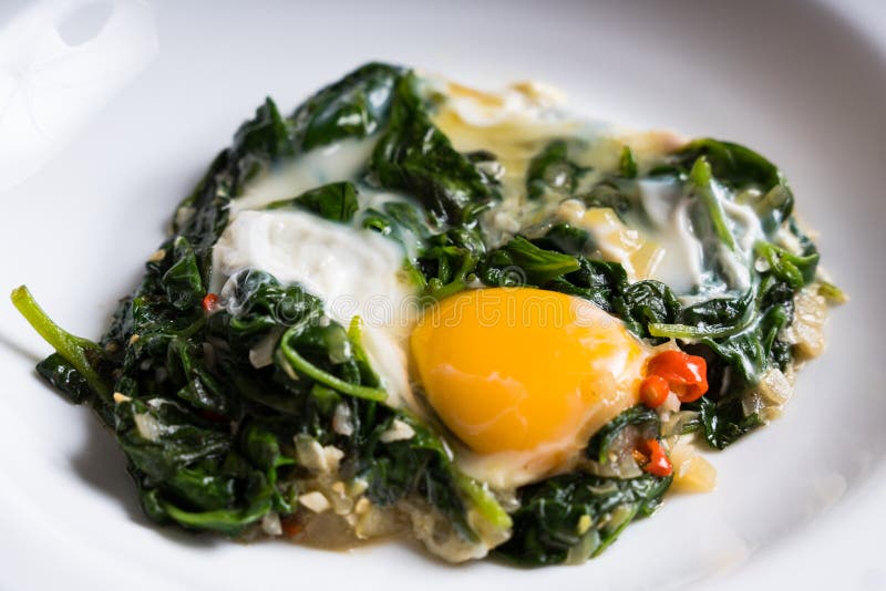 Spicy Stir Fried Spinach with Egg Also Known As Nargesi Stock Photo ...
