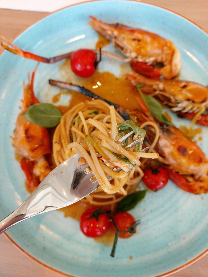 Spicy Tom Yum spaghetti stock image. Image of spicy - 180468867