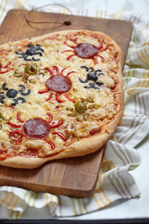 Halloween Spider Pizza with Tomato Sauce and Cheese on a Wooden Stock ...
