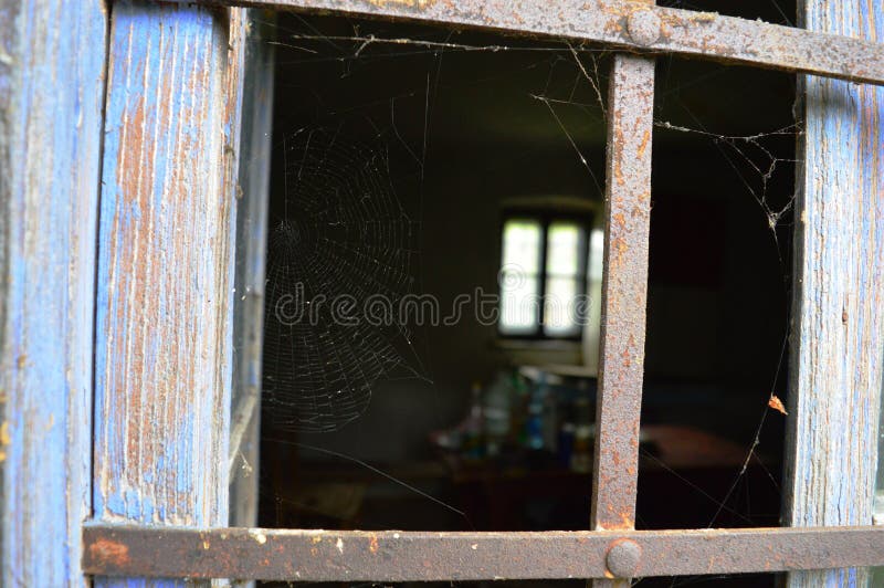 Spider Web on the Window of the Abandoned House Stock Image - Image of ...