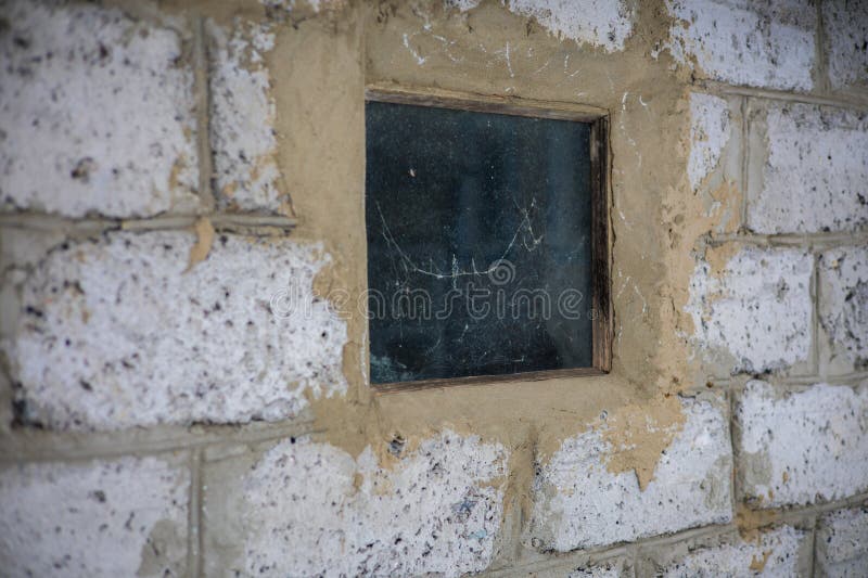 Spider Window in Brick Wall a Small, Dirty Window Set into an Old ...