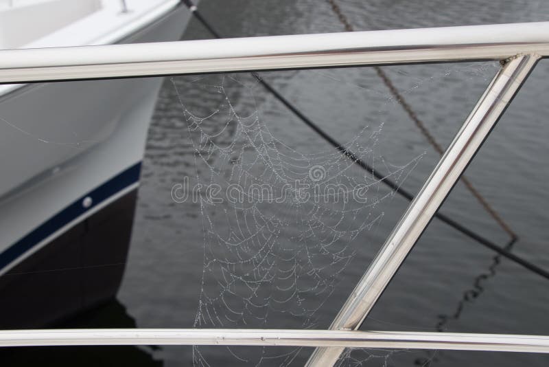 Spiderweb on the Rail of a Boat Stock Photo - Image of spider, boat ...