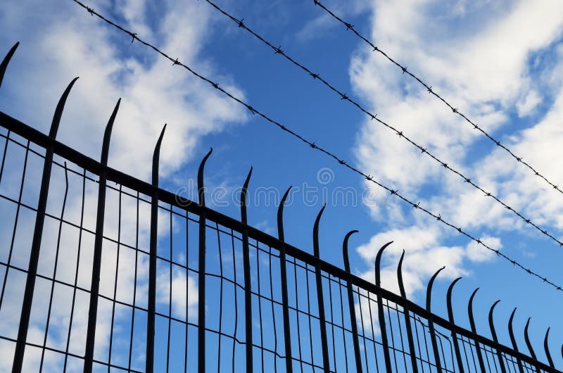 Spiked Fence Silhouette stock image. Image of spikes - 35829119