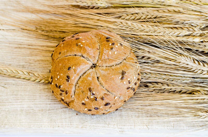 Spikes of rye and pastry stock photo. Image of food - 230445448