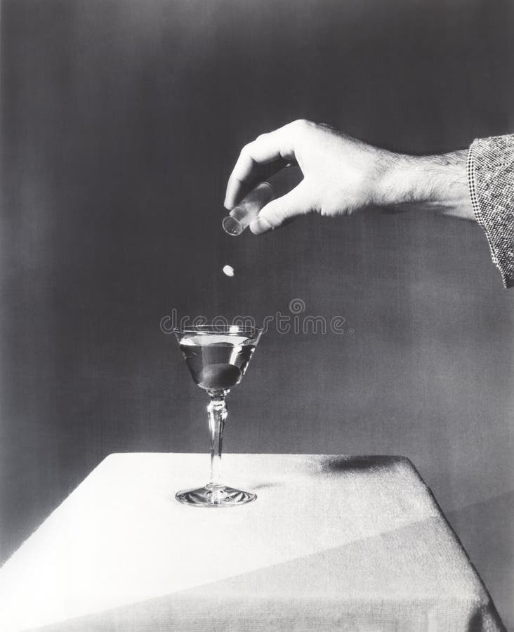 Spiking a drink stock photo. Image of ovall, black, ov1608 - 77561614