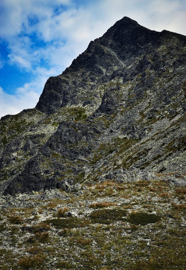 Spiky Rock Against Blue Sky Stock Image - Image of shell, coast: 148528747